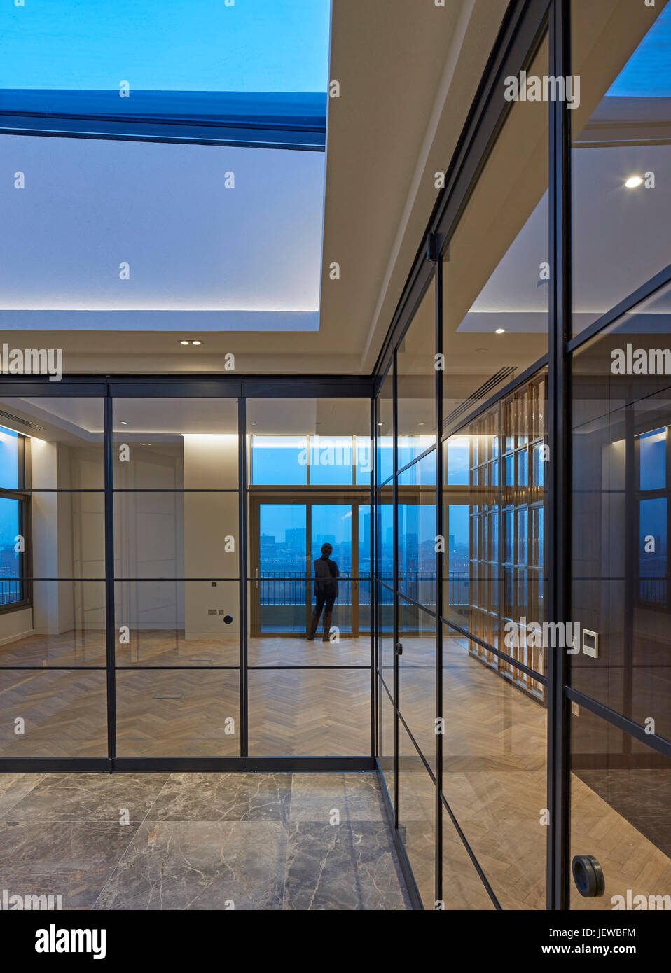 Interior view in winter garden towards dusk. Penthouse at the Tapestry ...