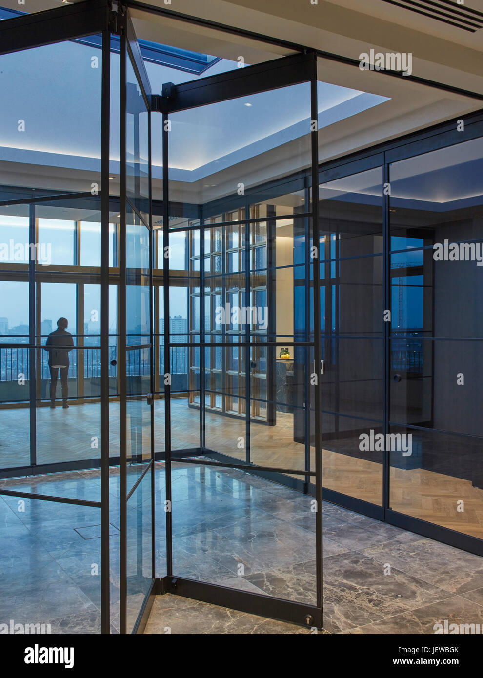 Interior view in winter garden towards dusk. Penthouse at the Tapestry ...