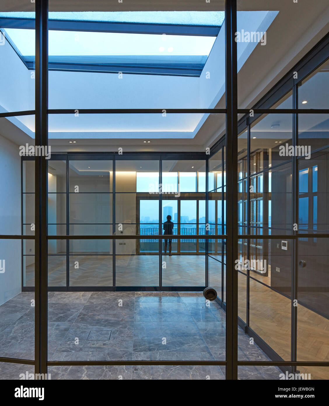 Interior view in winter garden towards dusk. Penthouse at the Tapestry ...
