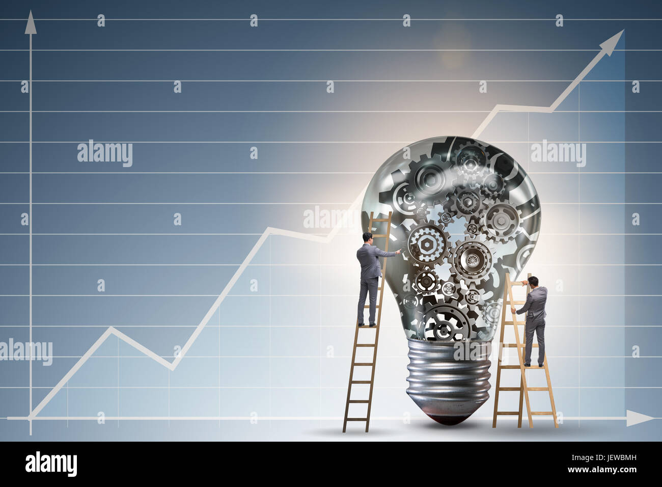 Businessman on ladder repairing light bulb Stock Photo - Alamy