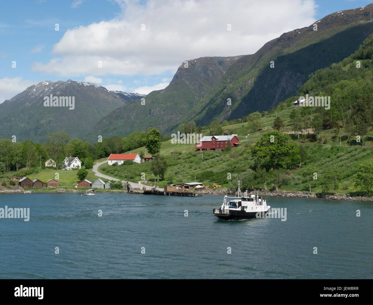 Car ferry crossing Lustrafjorden from Urnes village to Solvorn Luster ...