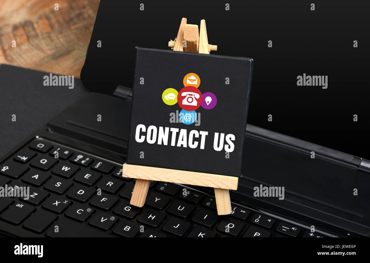Contact Means icons with contact Us sign on chalkboard Stock Photo - Alamy