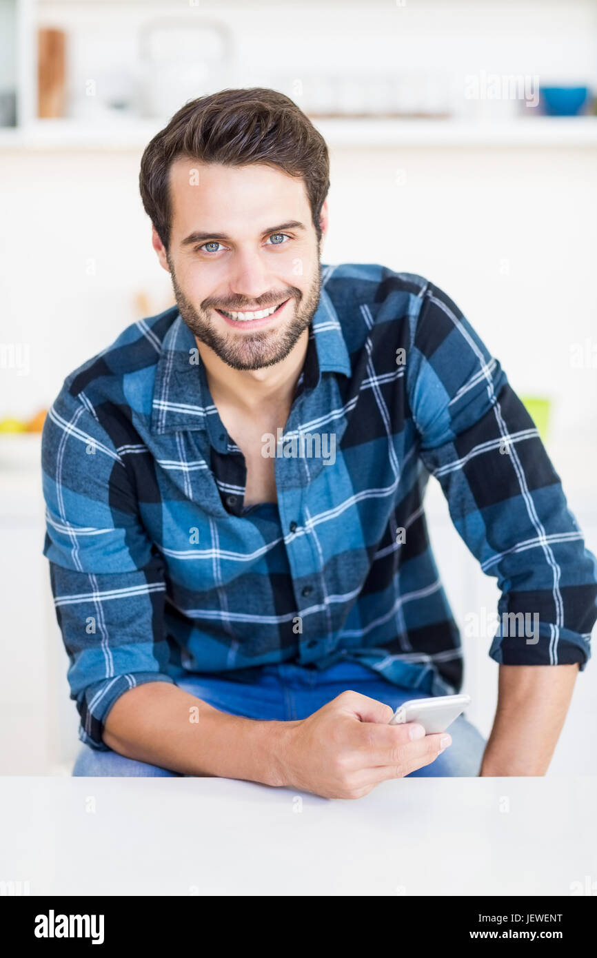 Man holding mobile phone Stock Photo - Alamy