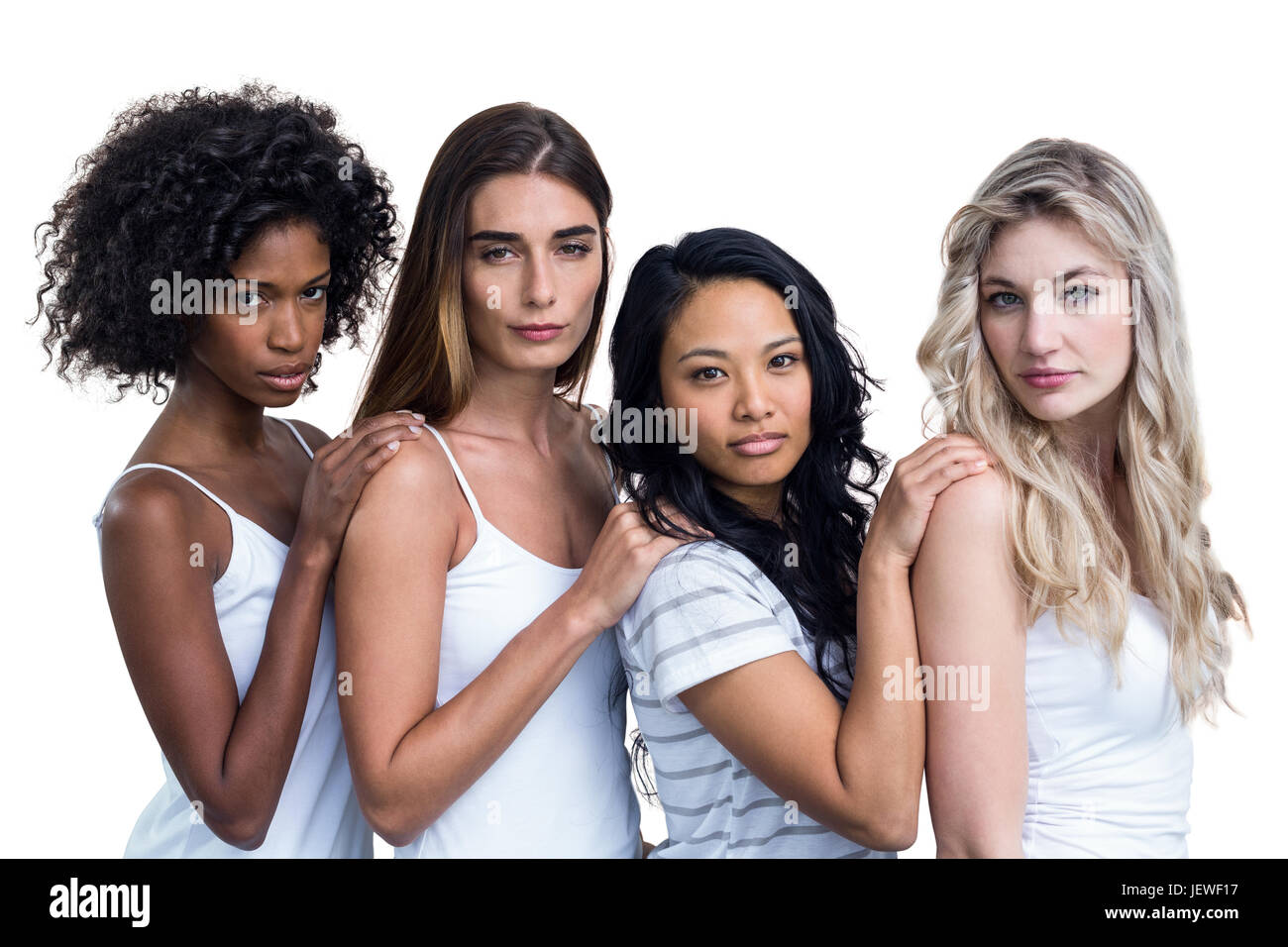 Multiethnic women standing in a line Stock Photo - Alamy