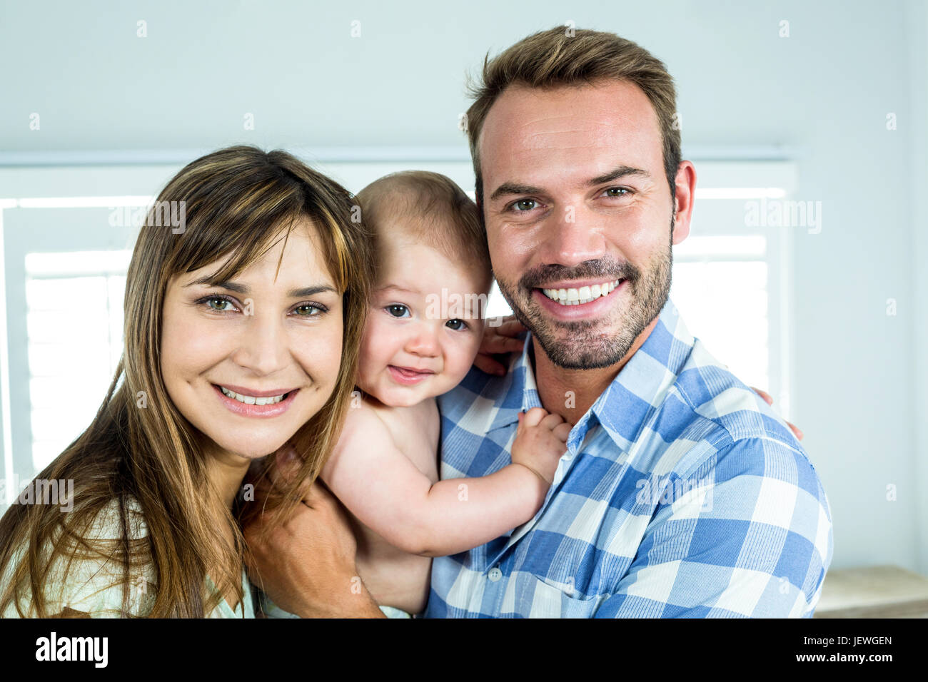 Portrait happy parents adorable hi-res stock photography and images - Alamy