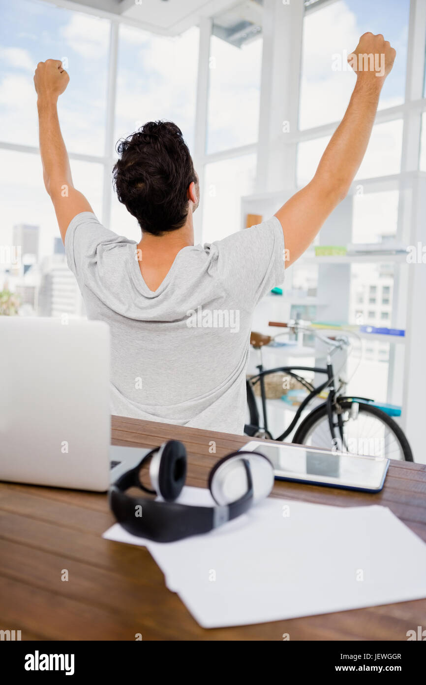 Man cheering desk hi-res stock photography and images - Alamy