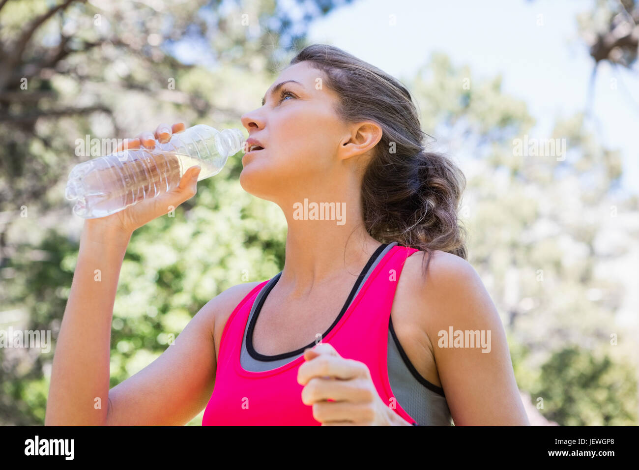 Fit woman drinking water hi-res stock photography and images - Alamy
