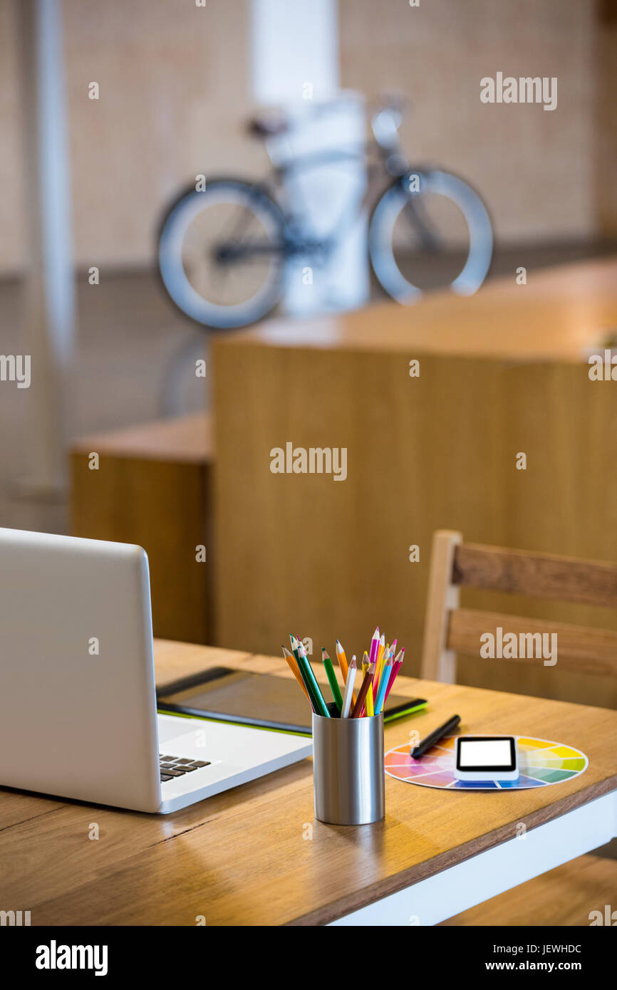 Office stationary and multi device at desk Stock Photo - Alamy