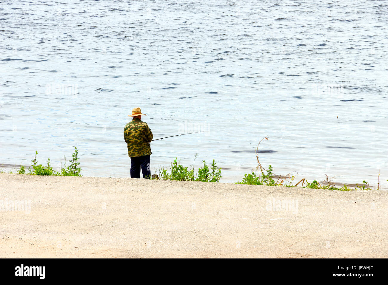 Lone cast fishing rod hi-res stock photography and images - Alamy