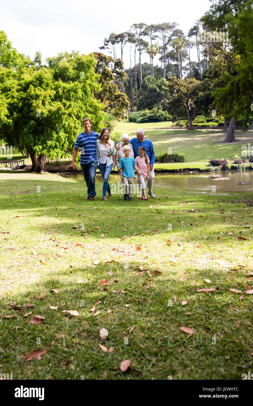 Cheerful multi generation family embracing hi-res stock photography and ...