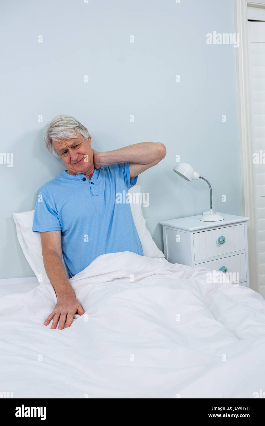 Senior man having neck pain Stock Photo - Alamy