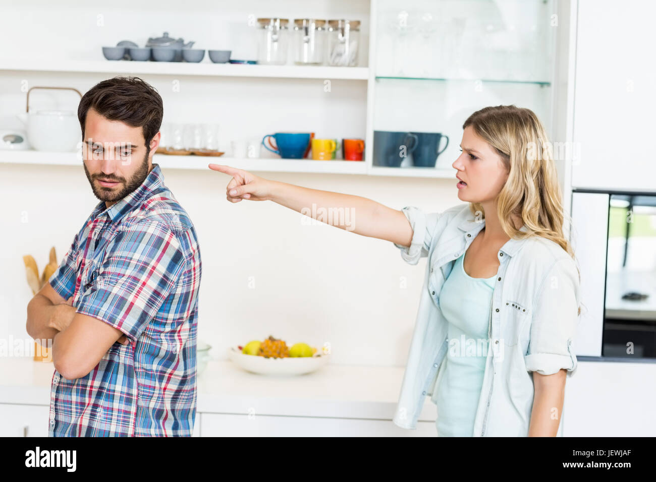Young couple into an argument Stock Photo - Alamy