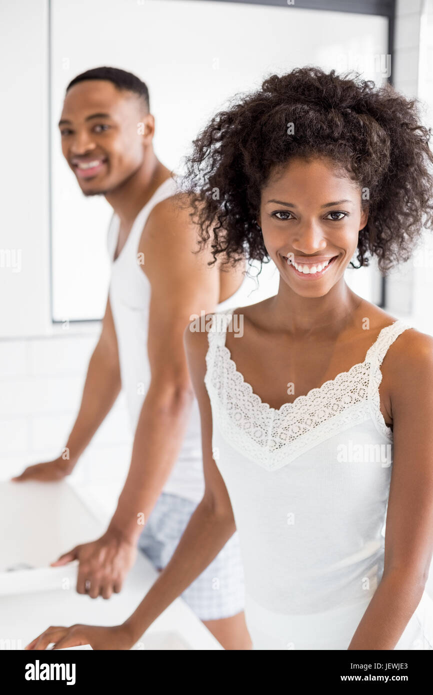 Portrait of happy couple in bathroom Stock Photo - Alamy
