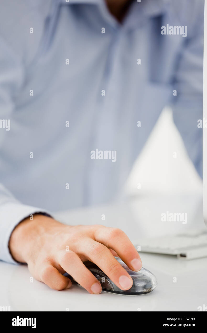 Mid-section of mans hand working on computer Stock Photo - Alamy