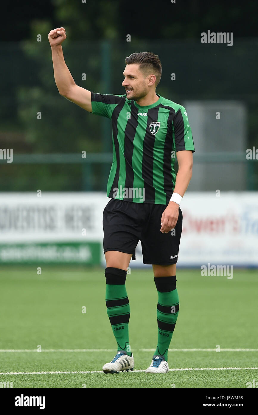 Europa FC's Alex Quillo celebrates scoring the opening goal during the ...