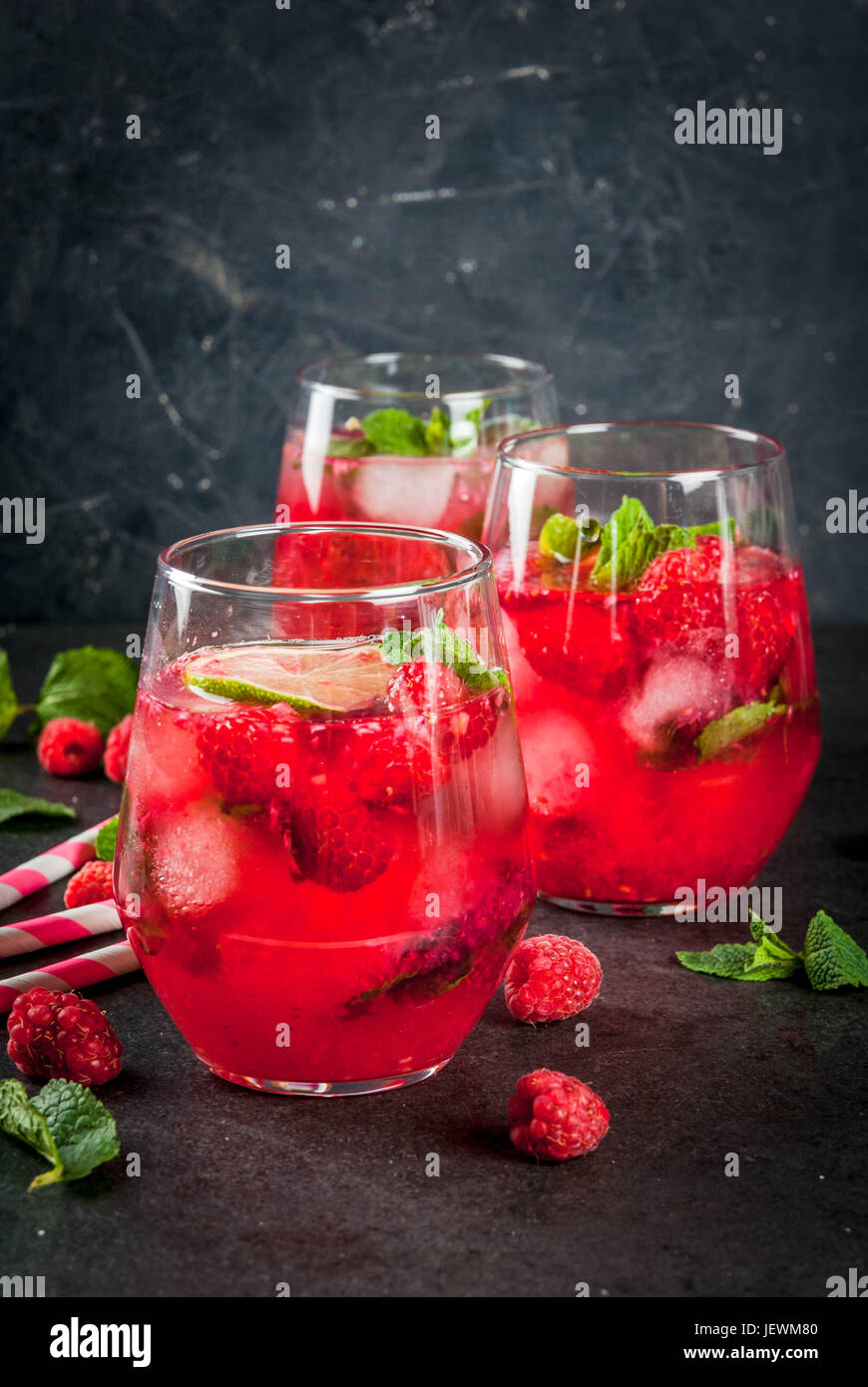 Summer refreshing non-alcoholic cocktails. Fruit drinks. Raspberry ...