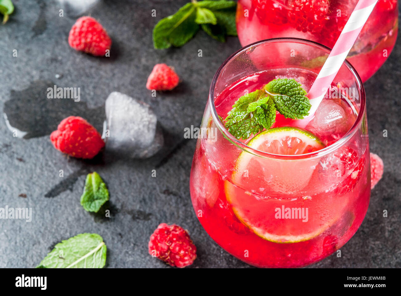 Summer refreshing non-alcoholic cocktails. Fruit drinks. Raspberry ...