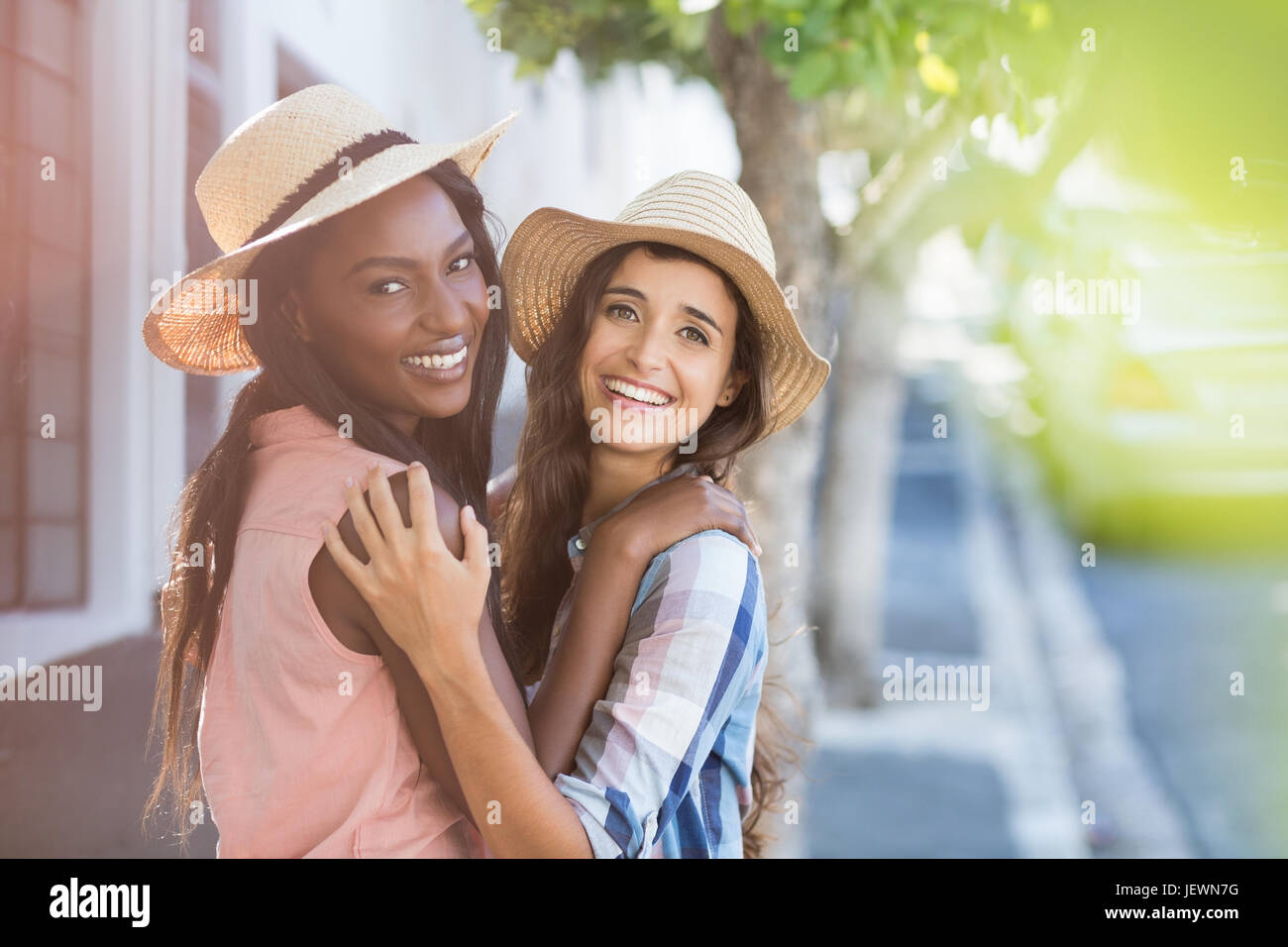 Friends embracing each other Stock Photo - Alamy