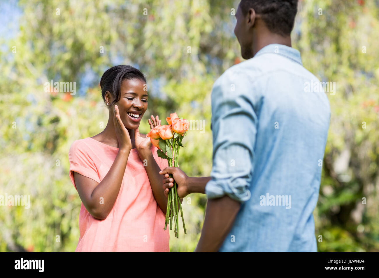 Happy woman having flowers hi-res stock photography and images - Alamy