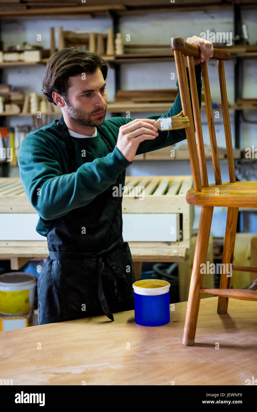 Carpenter working on his craft Stock Photo - Alamy