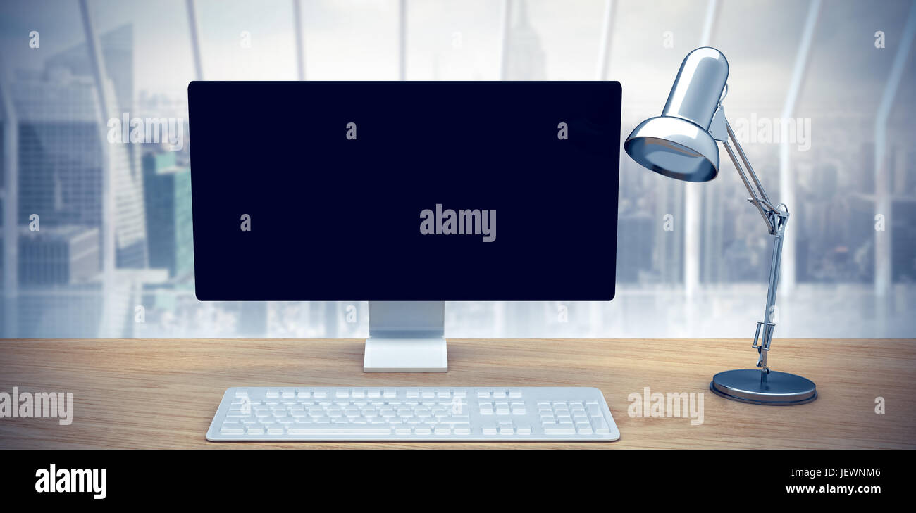 Composite image of computer on a desk Stock Photo - Alamy