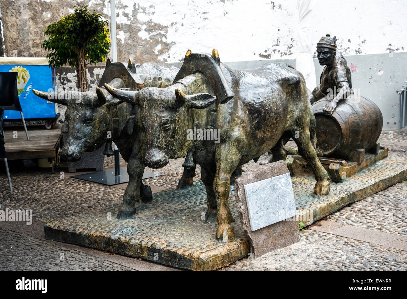 Bronze Statue of Oxen and their Driver pulling goods on wooden runners ...