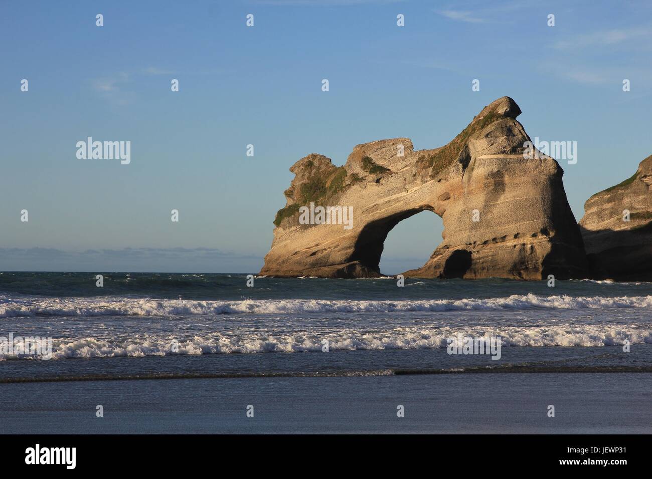 Unique rock formation at Wharariki Beach Stock Photo - Alamy