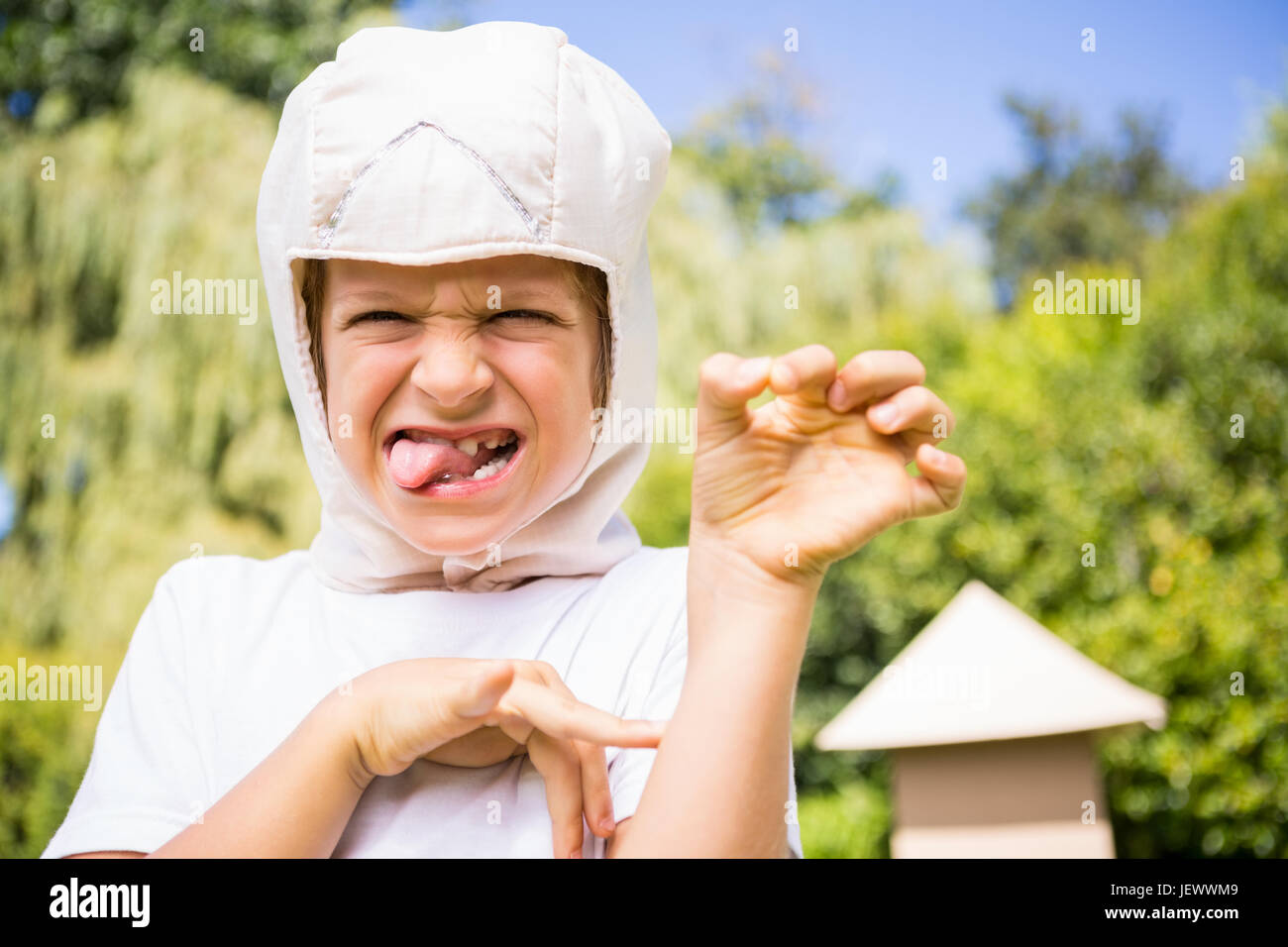 A kid is doing a funny face Stock Photo - Alamy