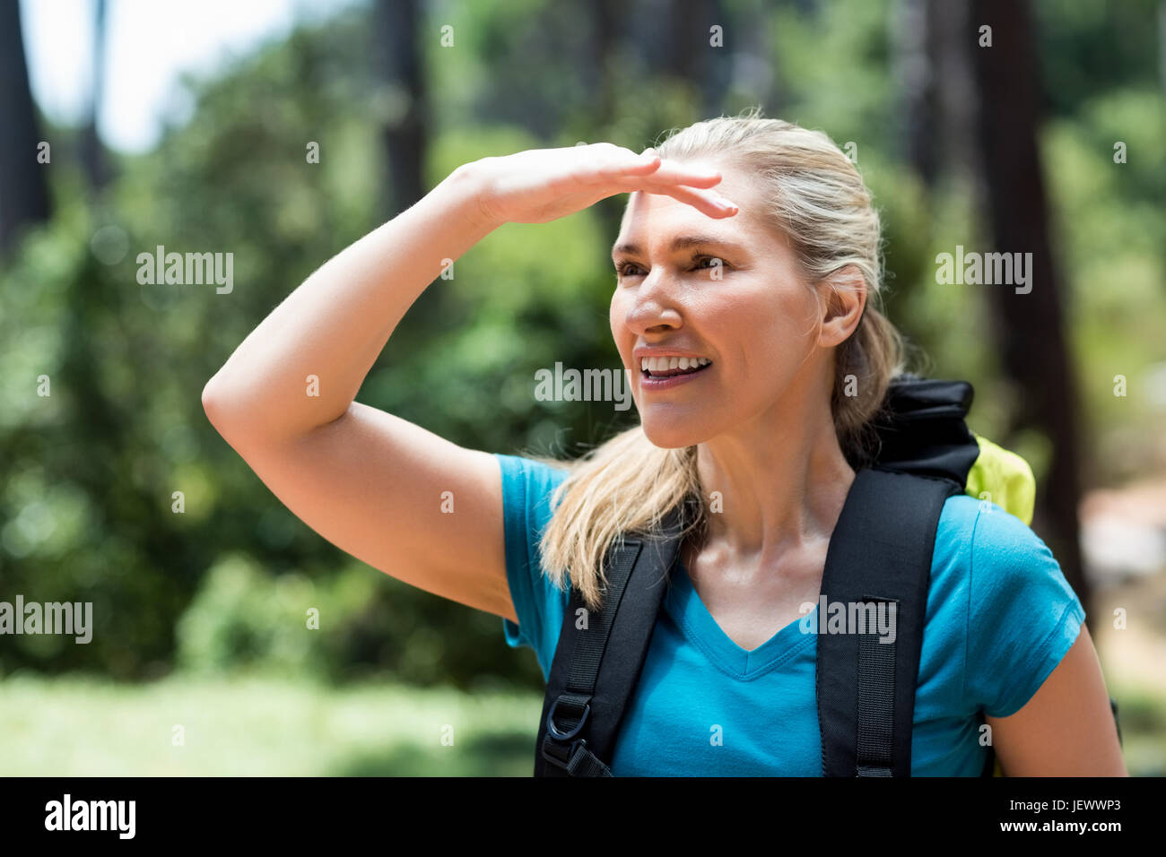 Woman looking something Stock Photo - Alamy