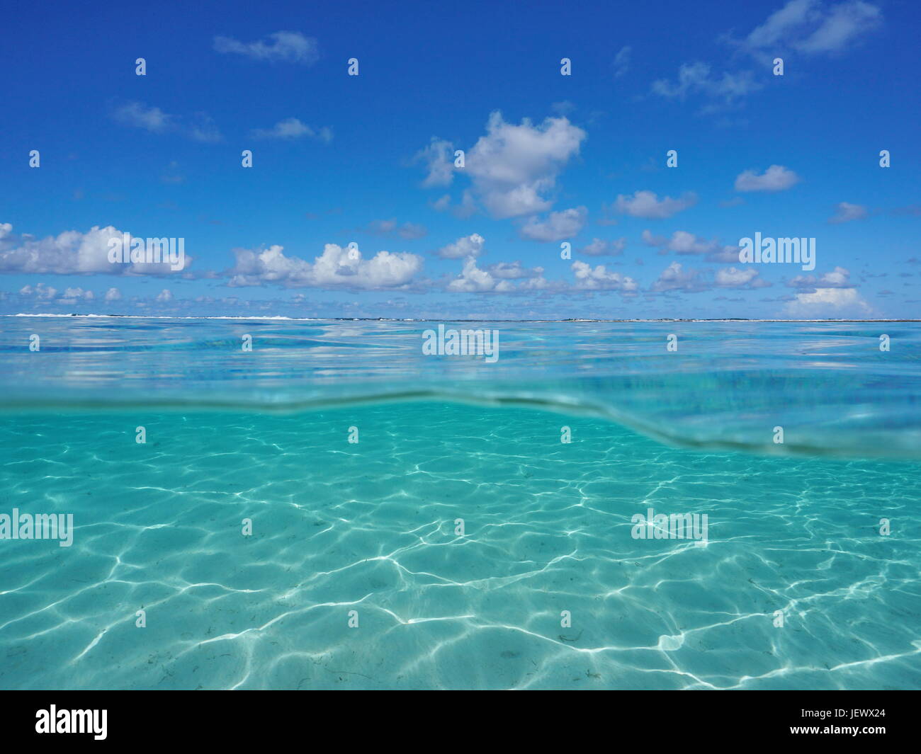 Seascape over and under sea surface, tropical lagoon with cloudy blue ...