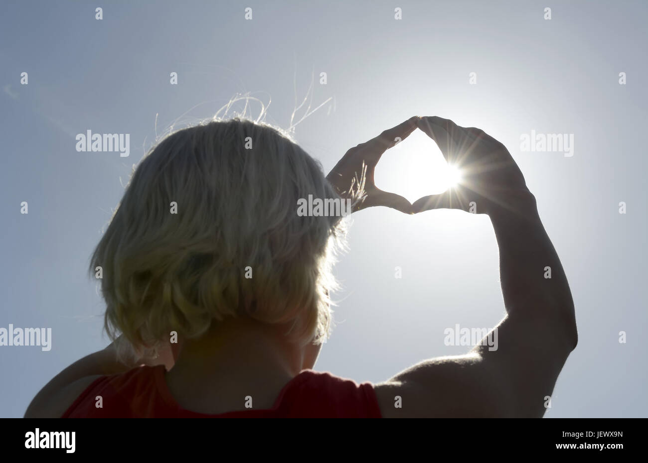 young blond woman catching sun Stock Photo - Alamy