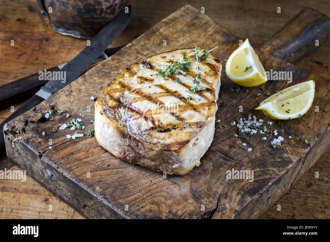 Barbecue Swordfish on Cutting Board Stock Photo - Alamy