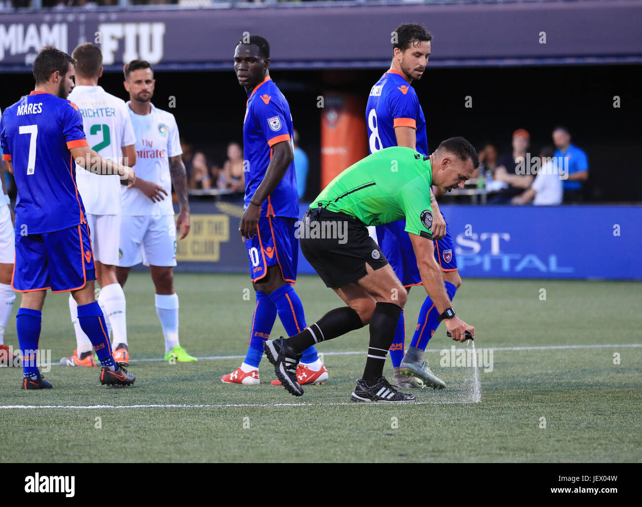 Miami, Florida, USA. 24th June, 2017. The referee marks the defensive ...