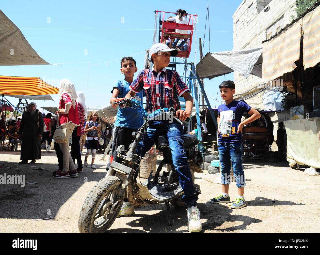 Damascus, Syria. 27th June, 2017. Syrian children enjoy the Eid al-Fitr ...
