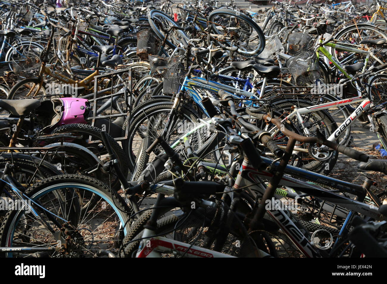 Chongqing, Chongqing, China. 27th June, 2017. Piles of abandoned bikes ...