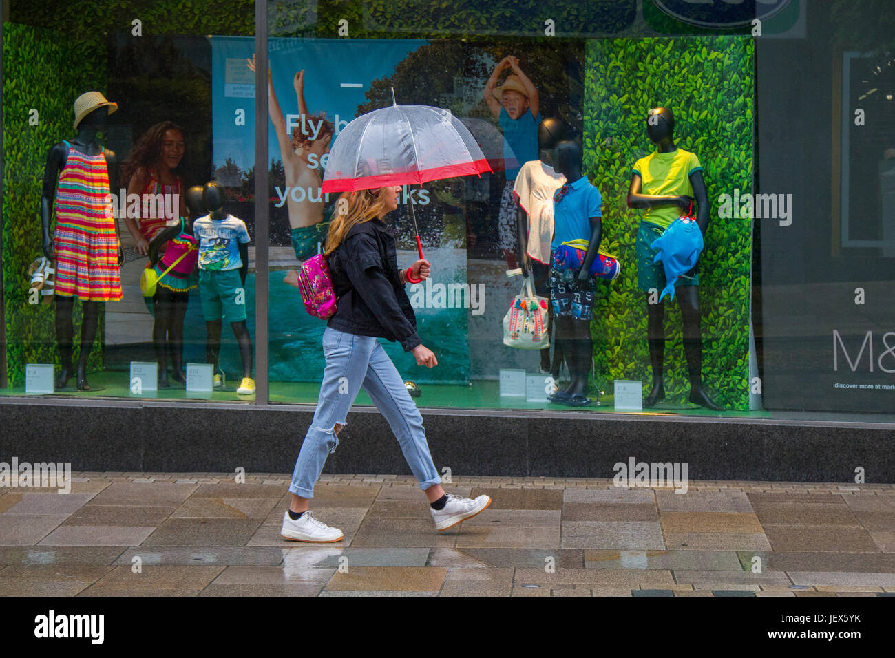 England retail shopping people wet weather rain people shoppers hi-res ...