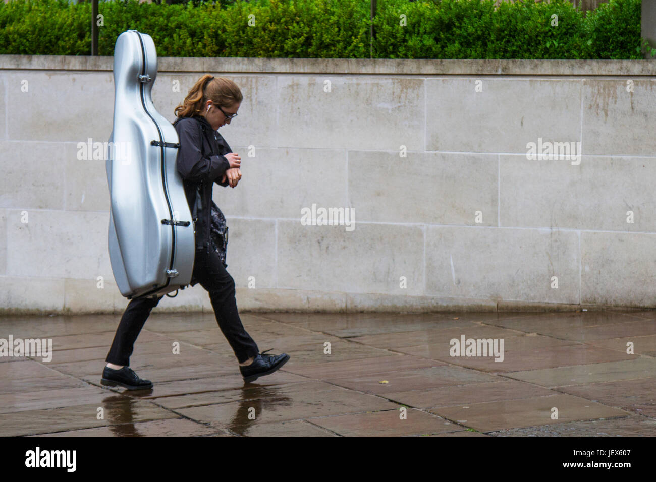 Cello case walking hi-res stock photography and images - Alamy