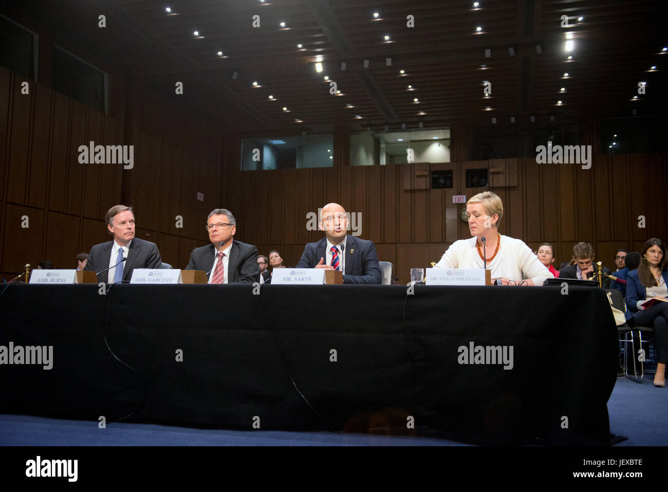 From left to right: Ambassador Nicholas Burns, Roy and Barbara Goodman ...