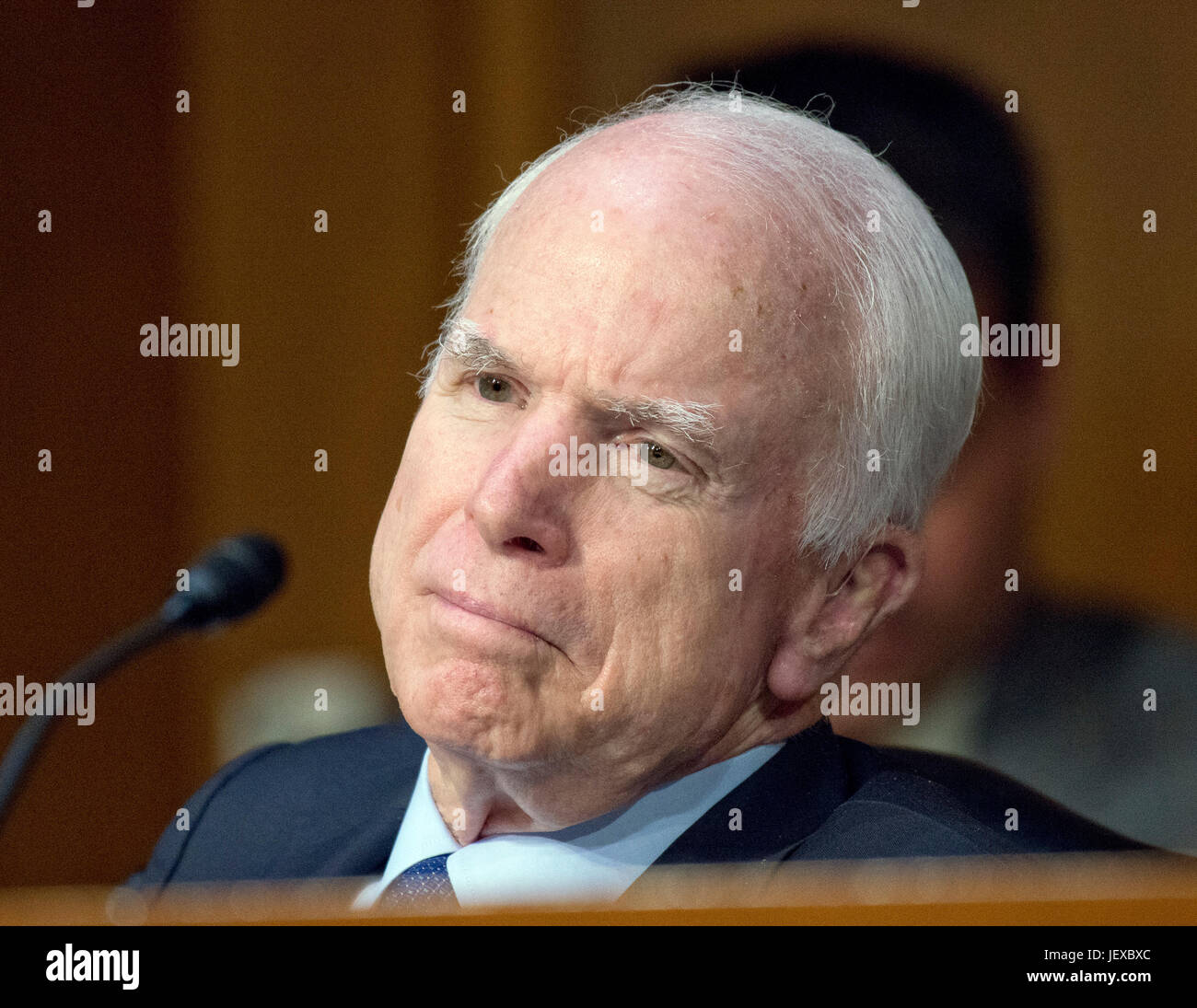 United States Senator John McCain (Republican of Arizona) listens to ...