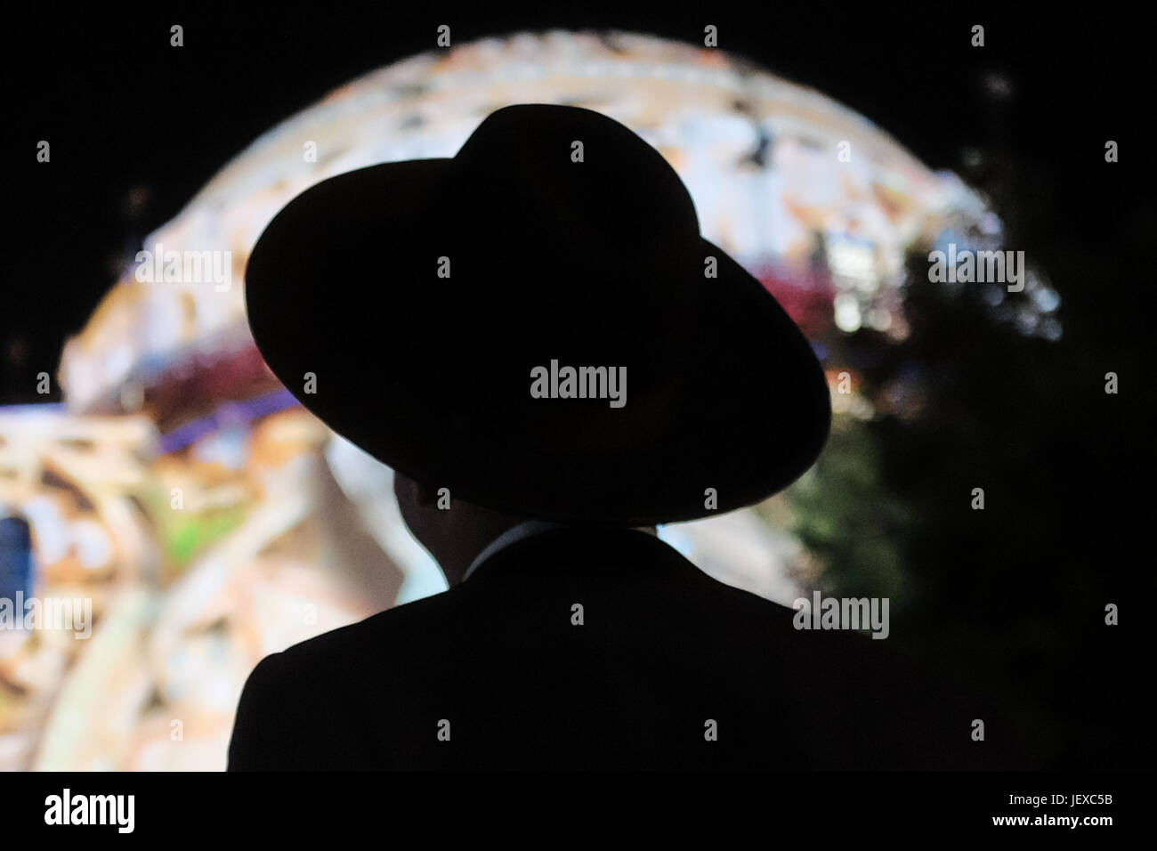 Jerusalem, Israel. 28th June, 2017. A religious Jewish man watches a ...