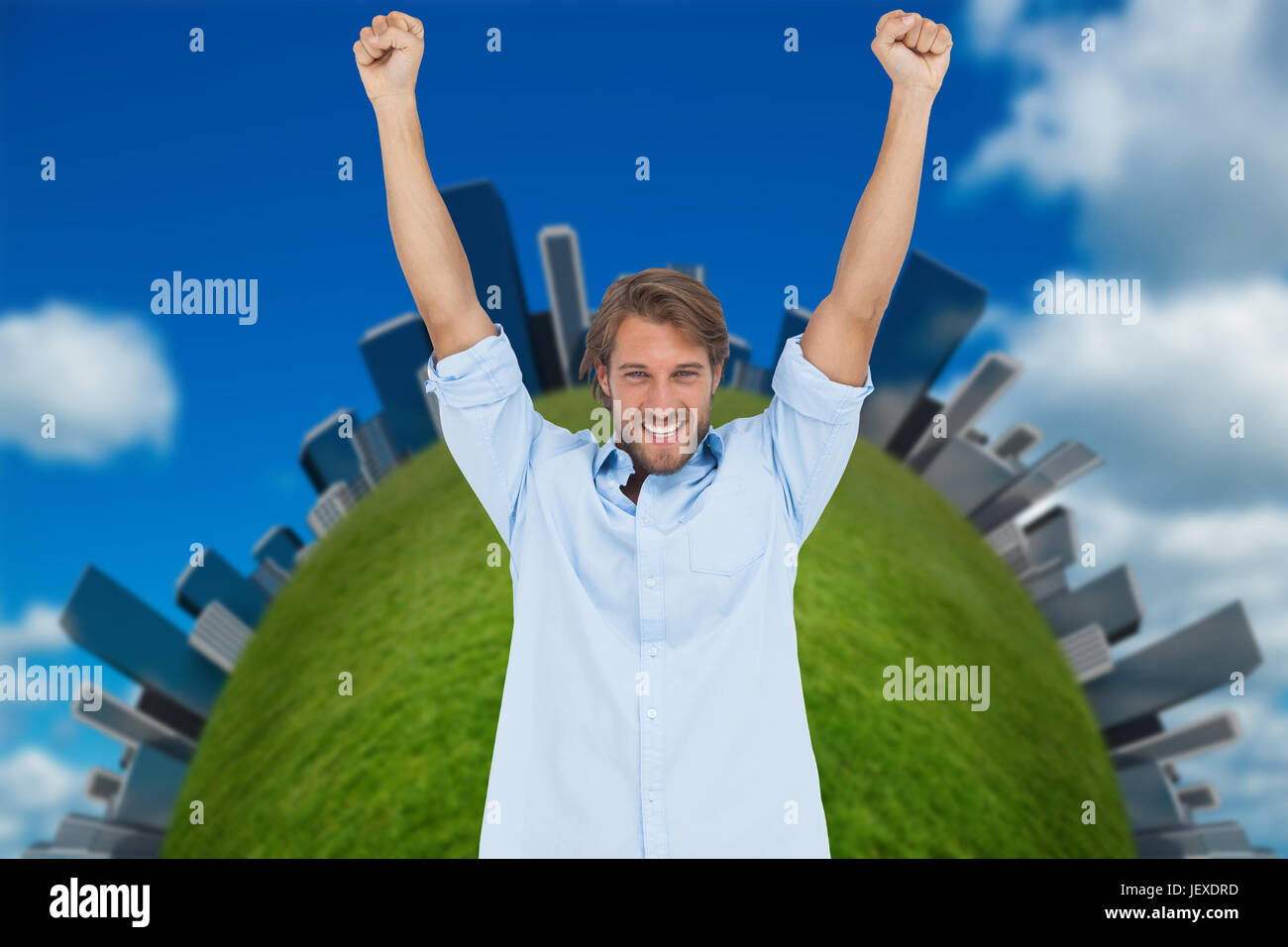 Happy man celebrating success with arms up Stock Photo - Alamy