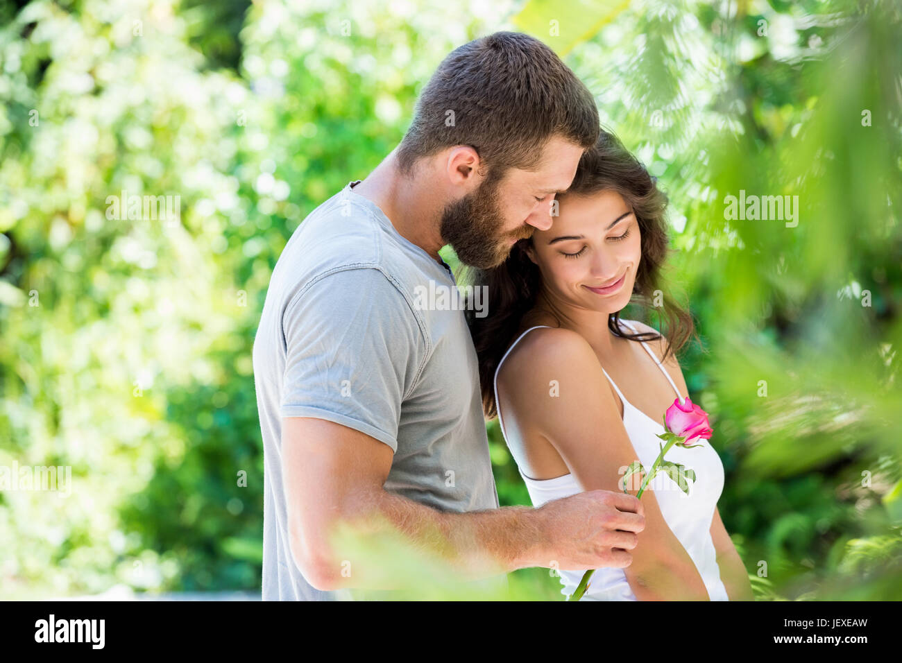 Couple rose garden offering hi-res stock photography and images - Alamy