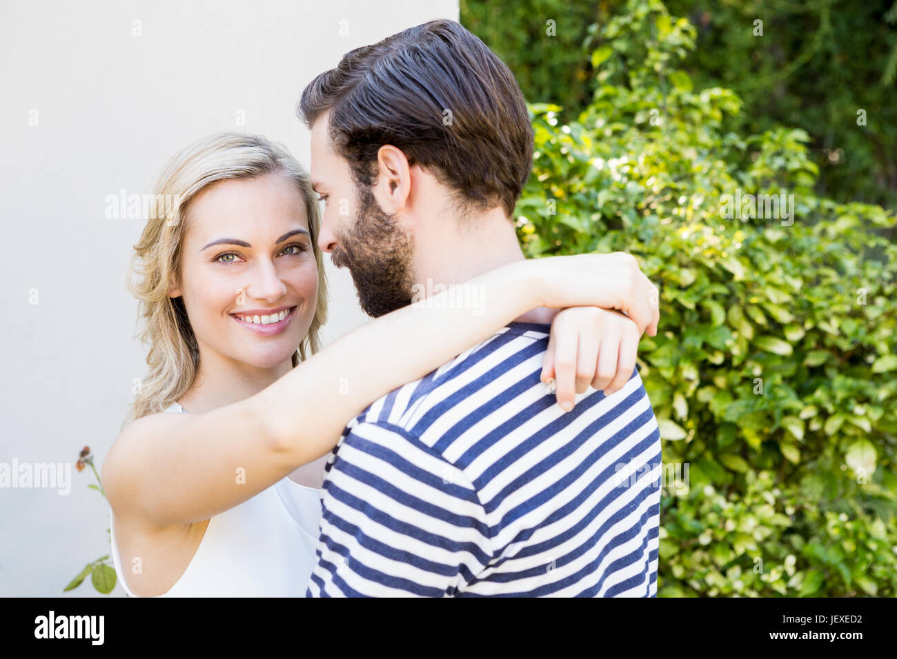 Couple embracing each other Stock Photo - Alamy