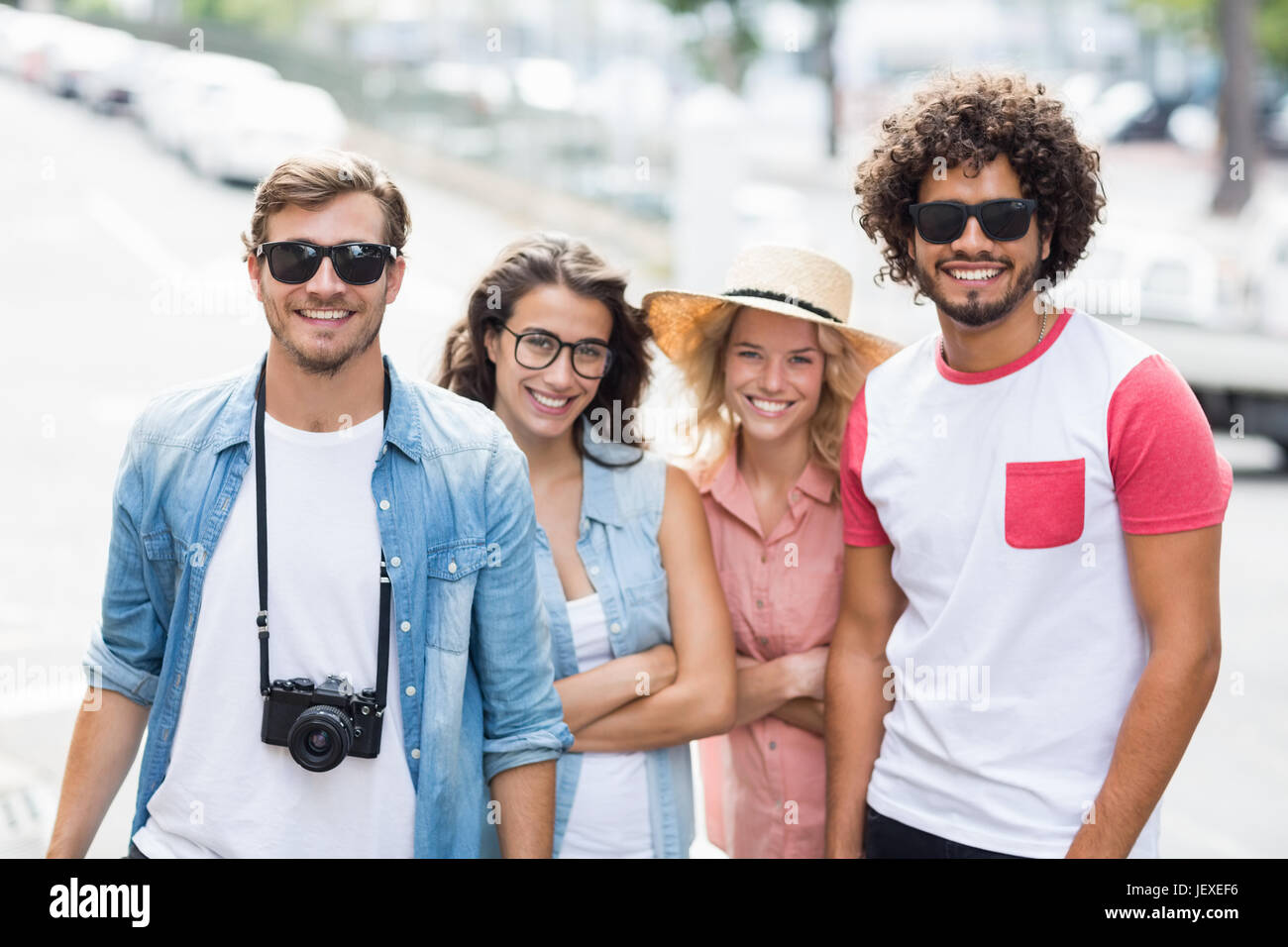 Friends posing at camera Stock Photo - Alamy