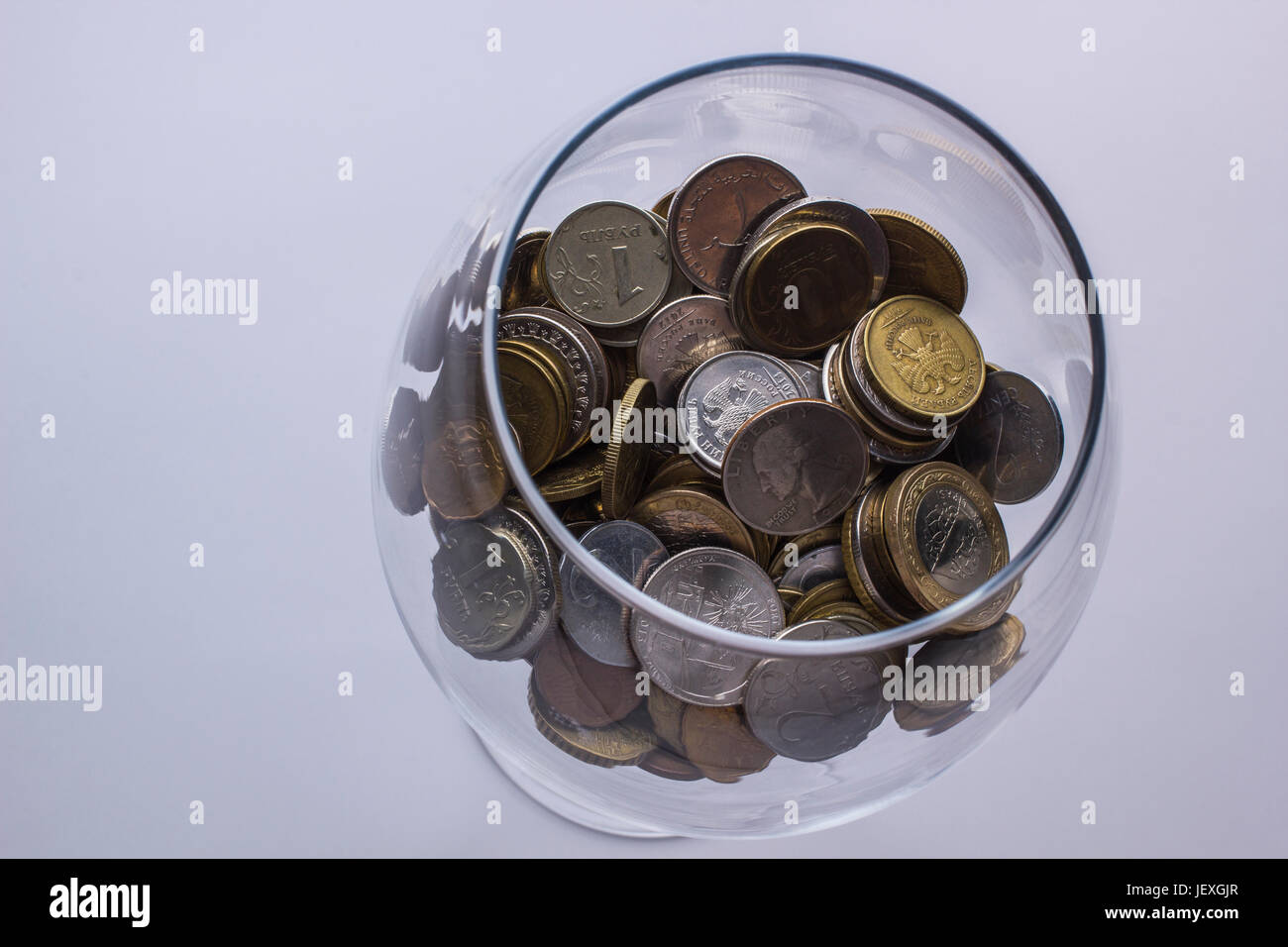 coins and glass Stock Photo - Alamy
