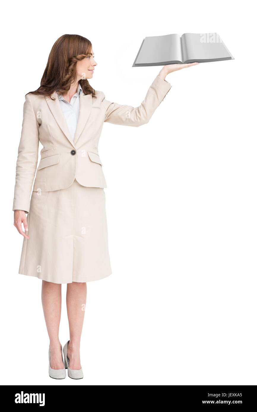 Businesswoman showing a book Stock Photo - Alamy