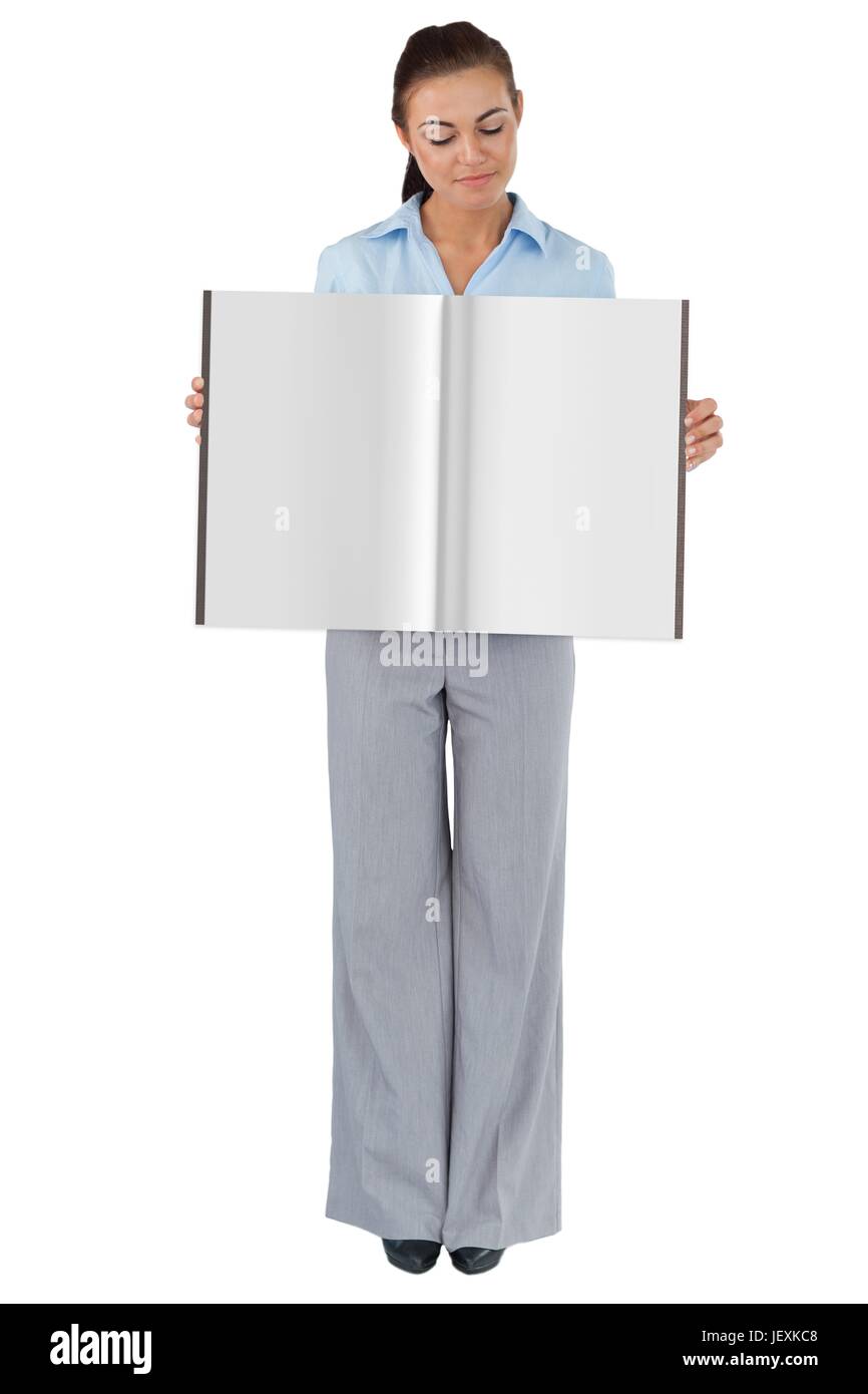 Pretty woman showing a book Stock Photo - Alamy