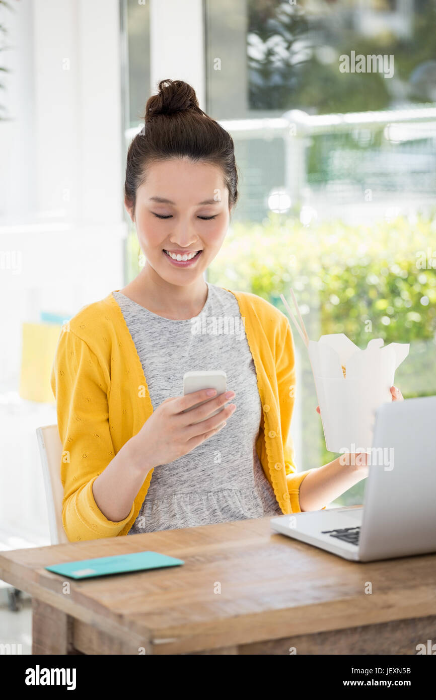 hipster girl is using her phone Stock Photo - Alamy
