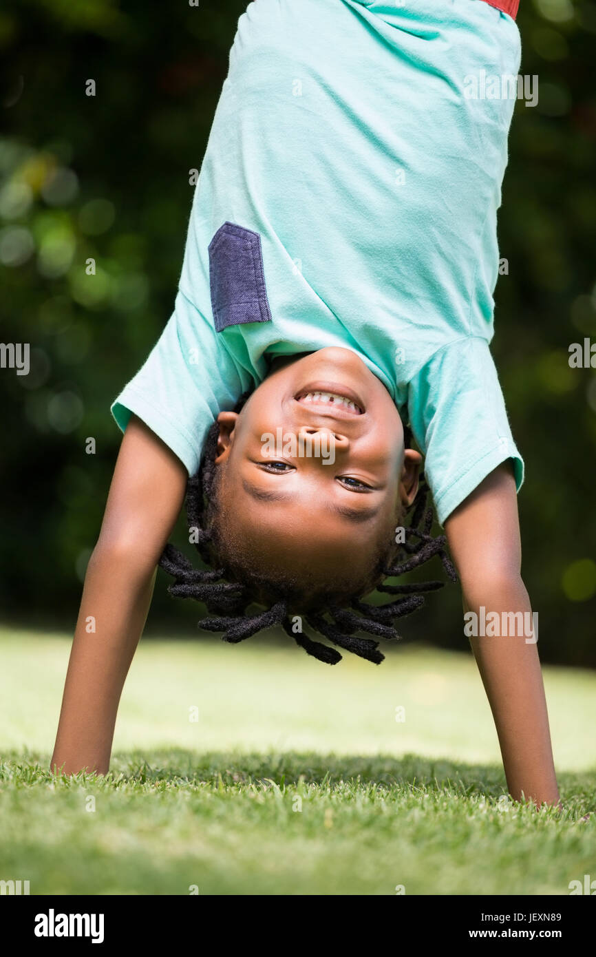 Boy doing handstand hi-res stock photography and images - Alamy