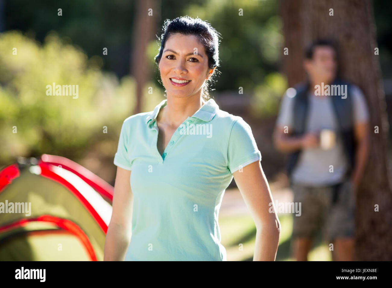 Woman smiling and posing Stock Photo - Alamy